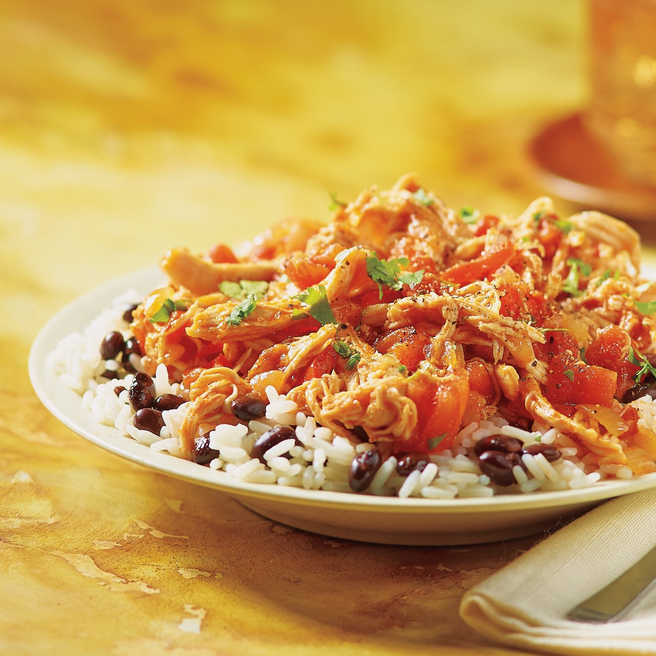 Slow Cooked Chicken with Black Beans and Steamed Rice Recipe from H-E-B