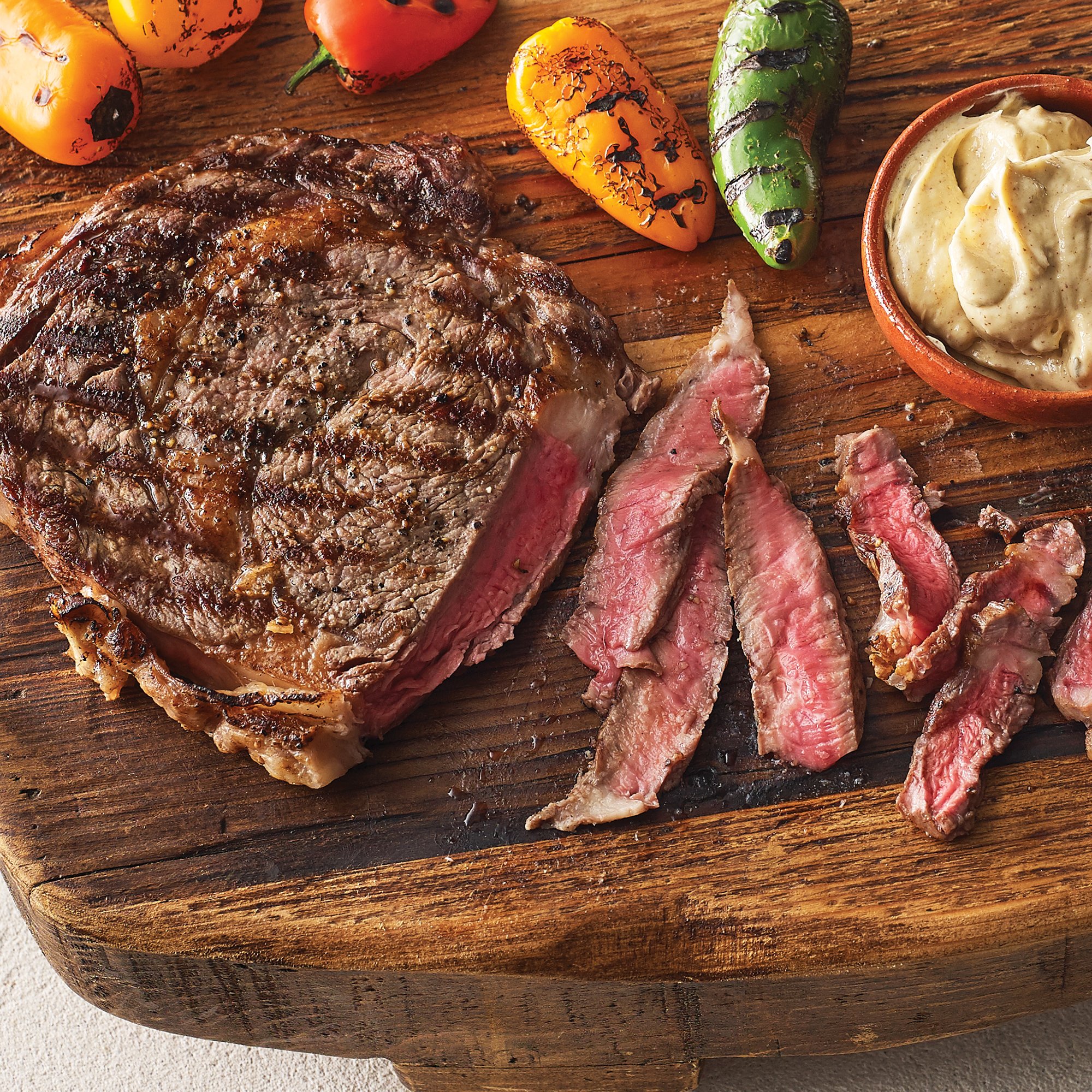 Grilled Ribeyes with Hot Mustard Butter Recipe from H-E-B